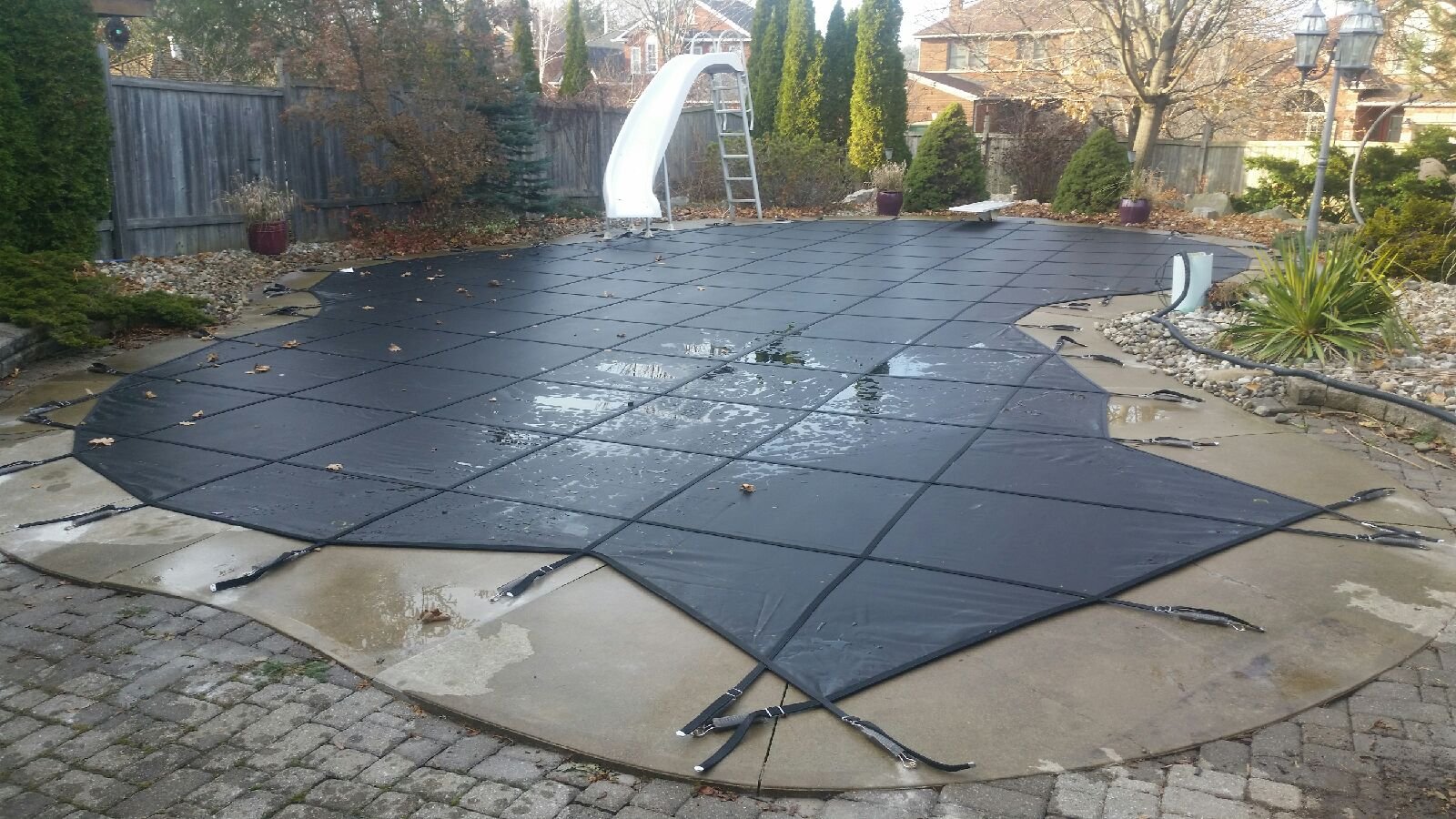 Mesh vs. Solid Safety Covers: Which Type Is Right for My Pool?